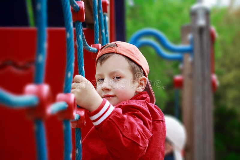 Little Boy Climbing on Jungle Gym without Rope and Helmet Stock Image ...