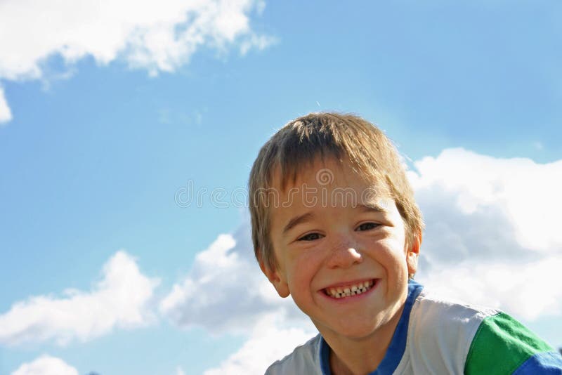 Boy stock image. Image of face, childhood, squint, straining - 1242231