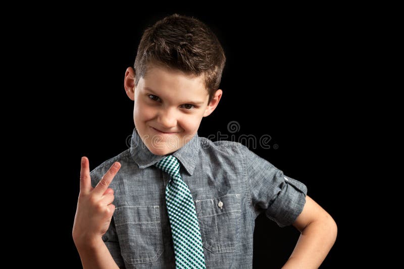 Boy Smirking and Making Peace Sign Stock Image - Image of sign, unity ...