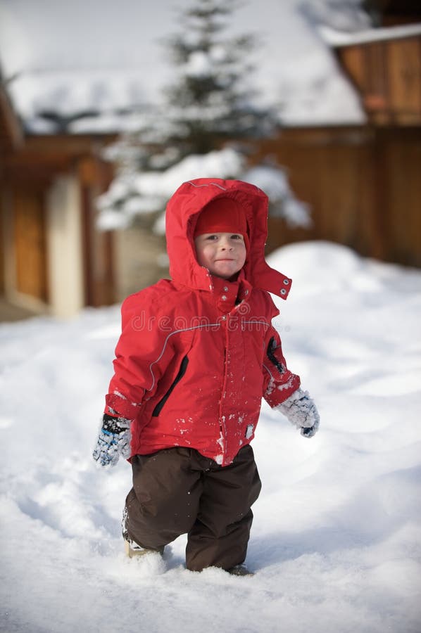 A boy in the snow stock photo. Image of resort, cute - 12742366