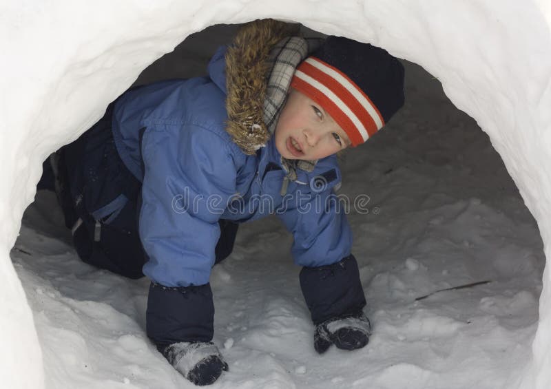 Boy in a snow cave. stock image. Image of depression - 13370259