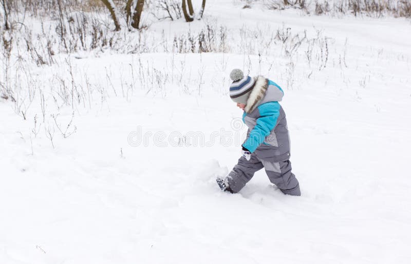 Boy on snow stock photo. Image of clothing, child, culture - 36151248