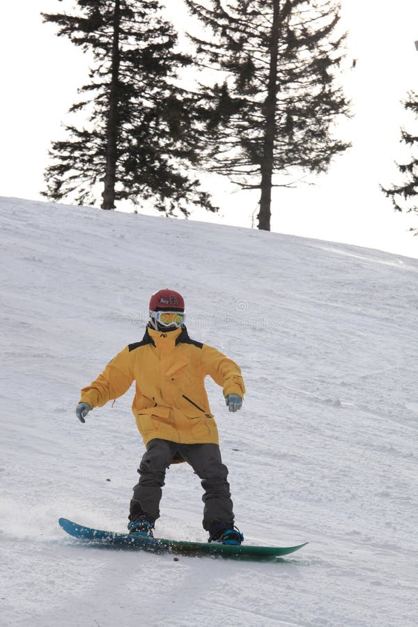 Boy Snowboarding on a Mountain Slope Editorial Photo - Image of ...
