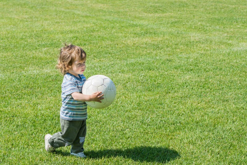 Little Boy Running with Ball Stock Photo - Image of football, playing ...