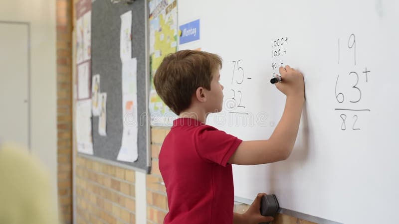 Boy Solving Math Problem at Whiteboard Stock Footage - Video of resolve ...