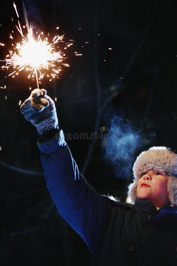 Children Playing with Sparklers Stock Photo - Image of watch, year ...