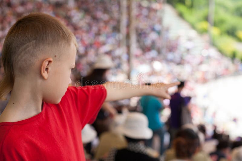 Boy among the Spectators at Representation Stock Photo - Image of young ...