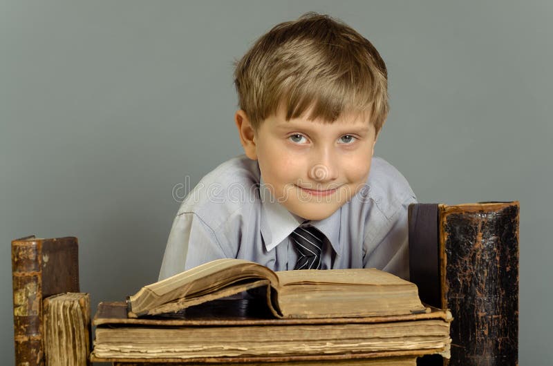 The Boy Spends Time Reading Old Books Stock Image - Image of learning ...