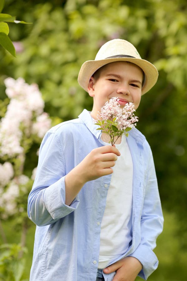 Boy in the Spring Botanical Garden Where Flowers Bloom Stock Image ...