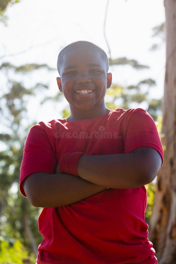 Boy Standing with Arms Crossed during Obstacle Course Training Stock ...