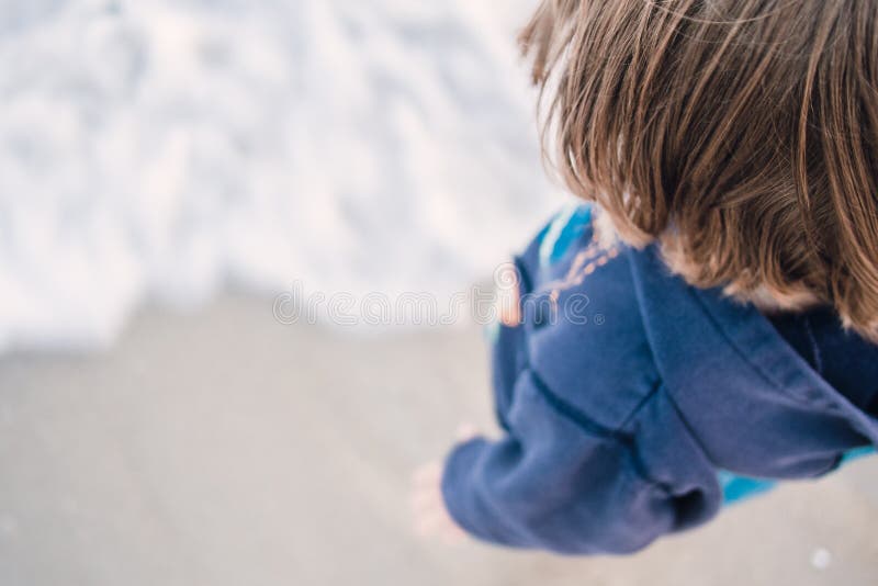 Boy standing on the beach stock image. Image of cape - 41034367