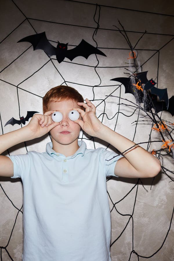 Boy Standing among Cobweb and Bats Stock Photo - Image of cheerful ...
