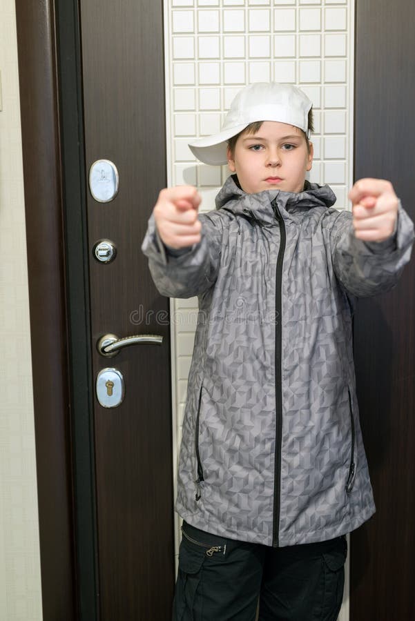 Boy Standing at Front Door of the House Stock Image - Image of conflict ...