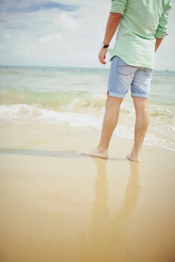 Boy Standing in Sea on Bournemouth Beach Stock Image - Image of copy ...
