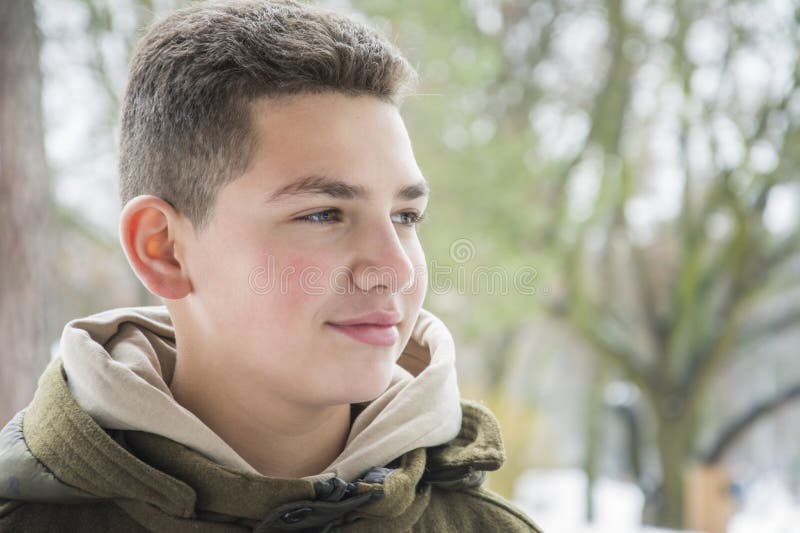 A Boy is Standing in the Spring Park Stock Image - Image of pleasure ...