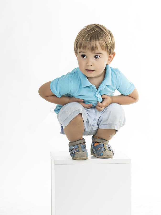 Boy Standing Still on a Cube Stock Image - Image of playing, still ...