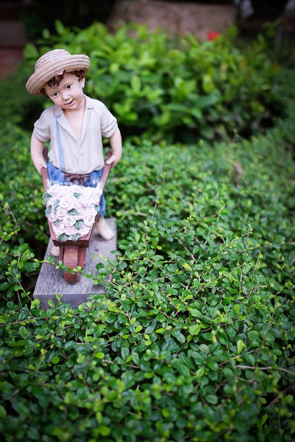 Boy statue stock photo. Image of farm, leaf, wide, plant - 60718144
