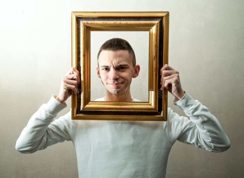 Boy with Strange Expression with a Frame Around His Face Stock Photo ...