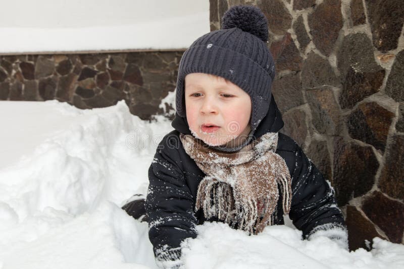 Boy stuck in snow stock image. Image of scarf, background - 35623329
