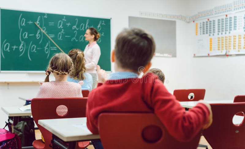 Boy Student in Elementary School Class Stock Photo - Image of people ...