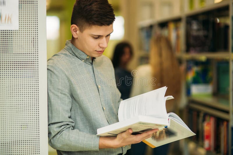 Boy Student in Library Want To Find Some Book Stock Photo - Image of ...