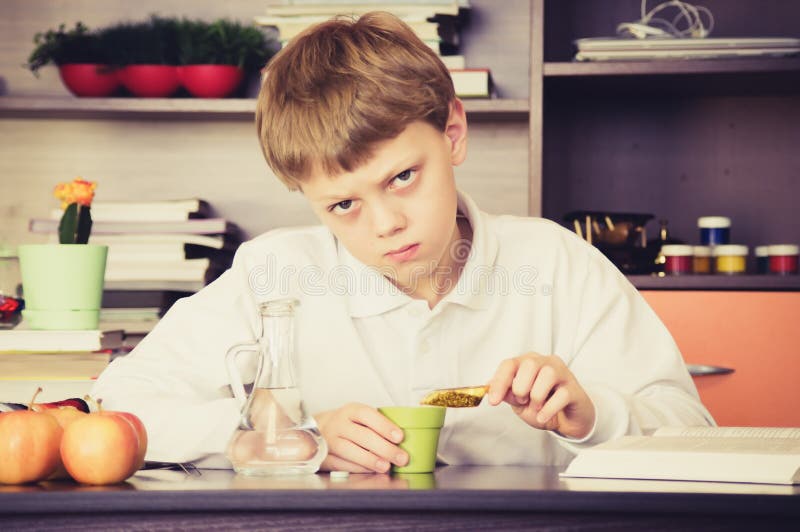 The Boy is Studying Biology Stock Image - Image of home, white: 49322903