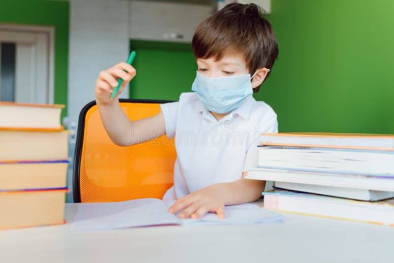 Boy Studying at Home with Notebook and Doing School Homework. Distance ...