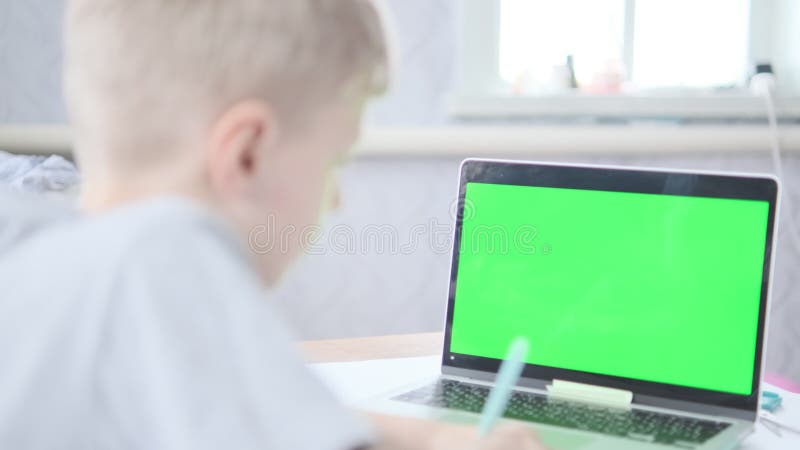Boy Studying Online at Mockup Laptop at Home. Student Doing Homework. E ...