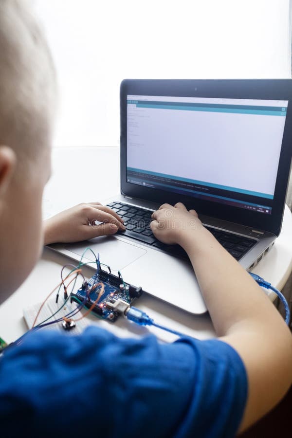 Programming for Children. the Boy is Studying Online at a Robotics ...