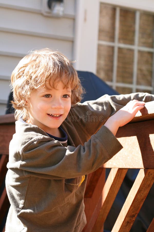 Boy in the sun stock photo. Image of playing, season, spring - 4902724