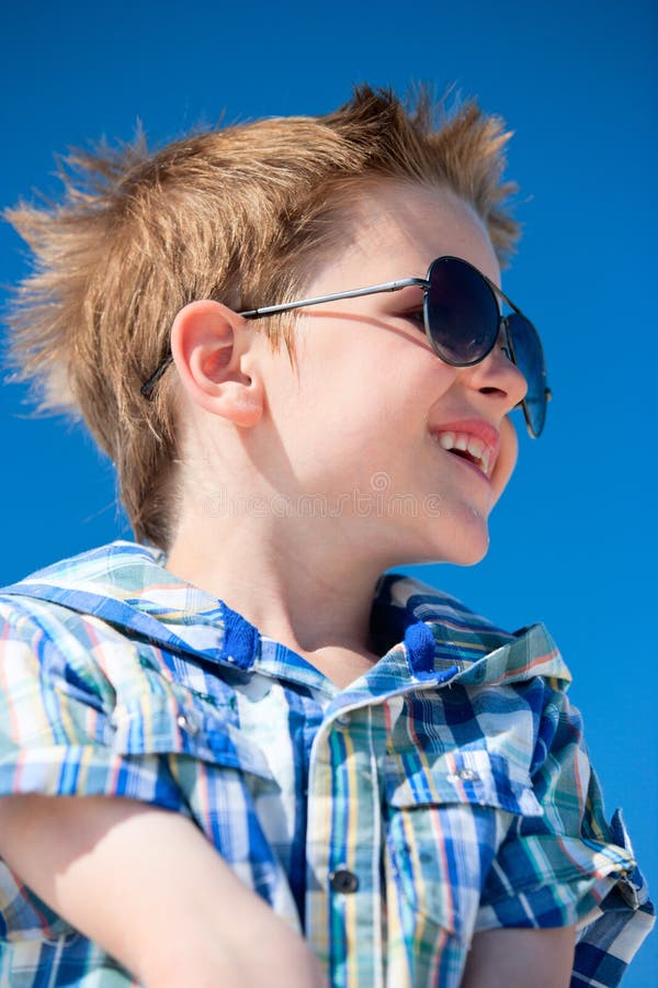 Boy in sun glasses stock photo. Image of blue, adorable - 19966346