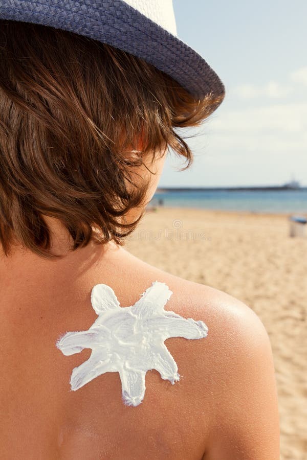 Boy Applying Sun Block Cream Tanned Body Stock Photos - Free & Royalty ...