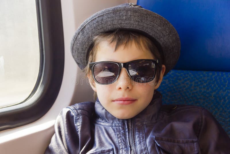 Boy in Sunglasses Rides on a Train Stock Image - Image of fast, motion ...