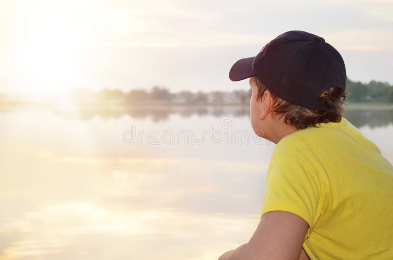 Boy and the sunset stock photo. Image of freedom, orange - 39901516
