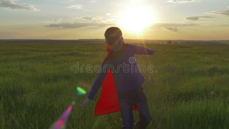 Boy Superhero in a Field at Sunset Stock Footage - Video of person ...