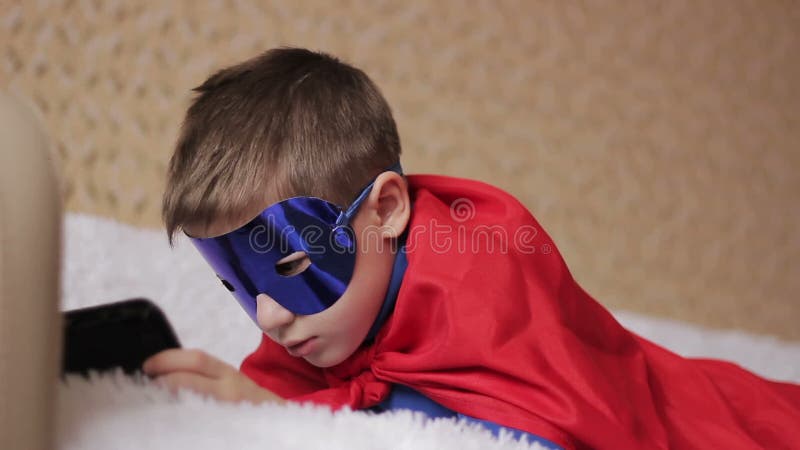 Boy superhero with tablet stock video. Video of digital - 67573177