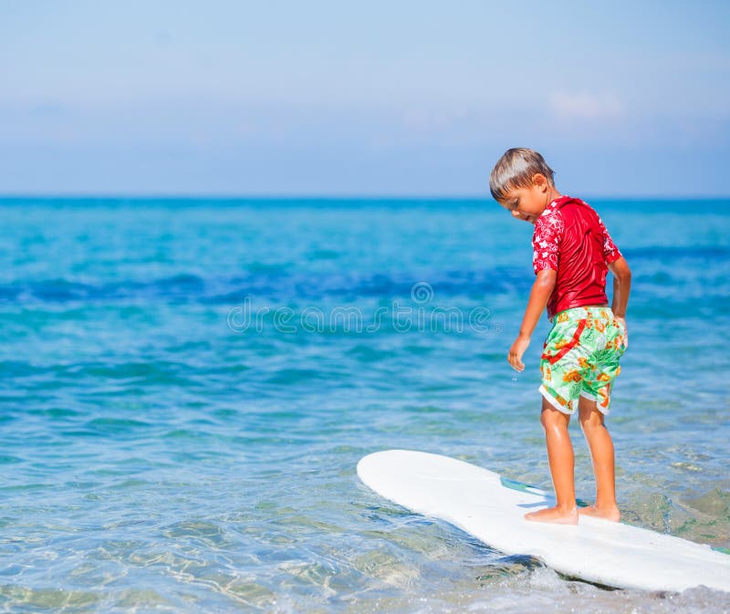 Boy with surf stock image. Image of happy, surfboard - 53250727