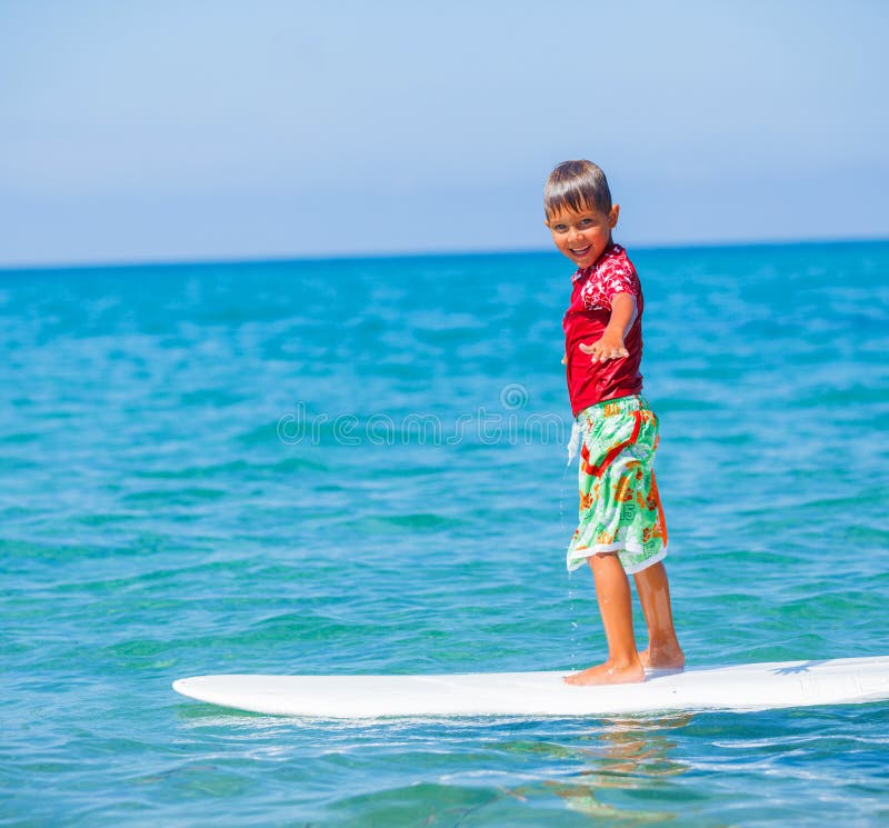 Boy with surf stock image. Image of joyful, surfboard - 53250731