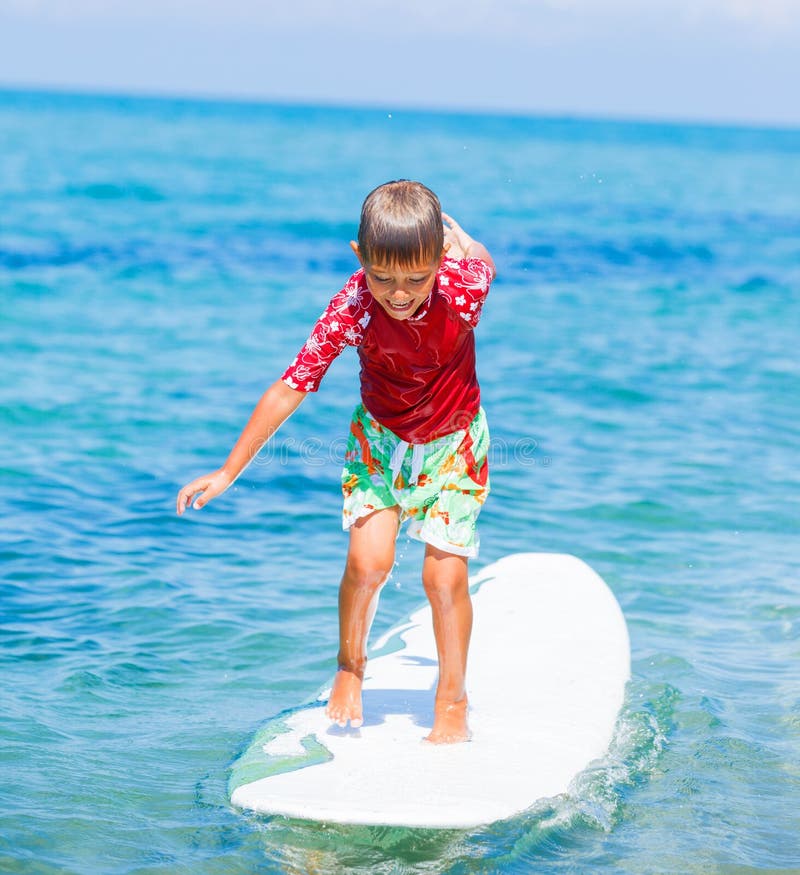 Boy with surf stock image. Image of enjoyment, summer - 53283613