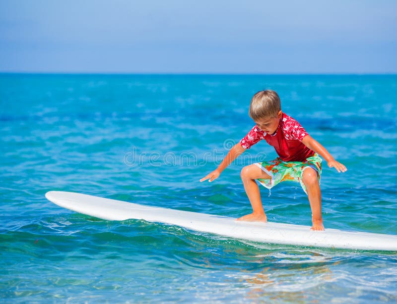 Boy with surf stock image. Image of surfing, happy, surfer - 53283821