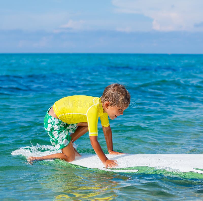 Boy with surf stock photo. Image of blue, people, sport - 54088938