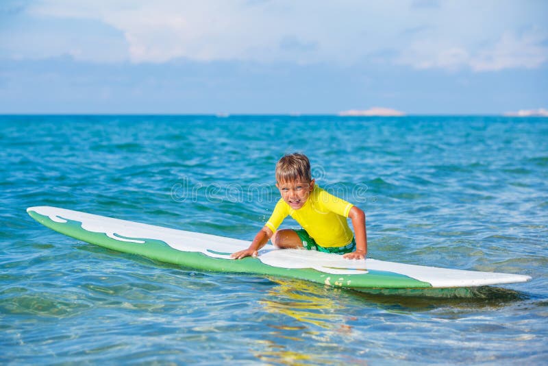 Boy with surf stock image. Image of happiness, face, surfing - 54089035