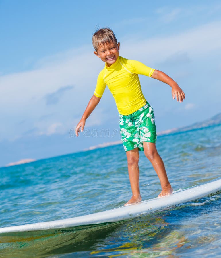 Boy with surf stock image. Image of leisure, surfboard - 54089121