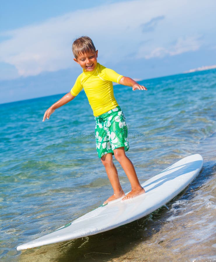 Boy with surf stock photo. Image of male, people, lifestyle - 54128908