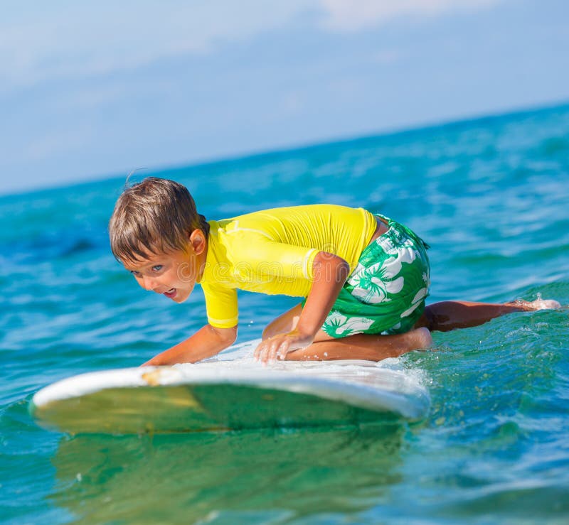 Boy with surf stock photo. Image of leisure, summer, face - 54128922
