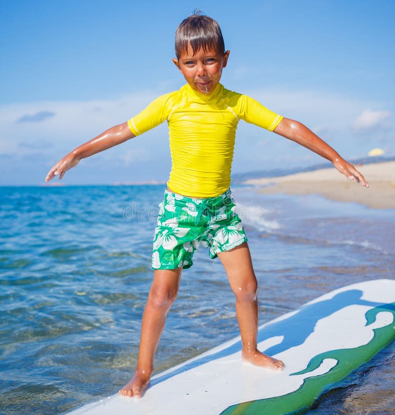 Boy with surf stock image. Image of sport, leisure, board - 55790867