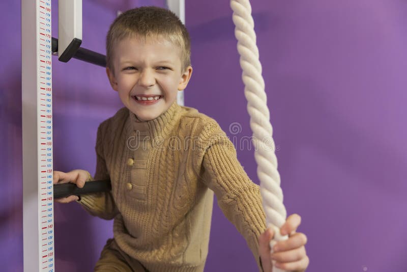 Little Children Holding Rope on Light Background Stock Photo - Image of ...