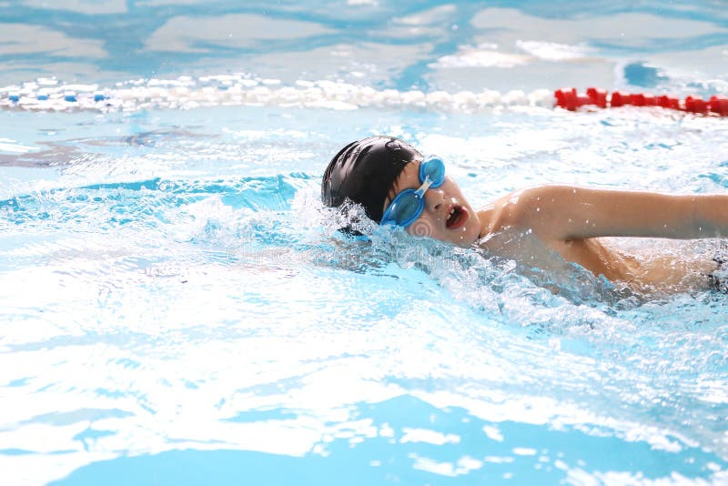 Boy swim in pool stock image. Image of competition, lifestyle - 143939685