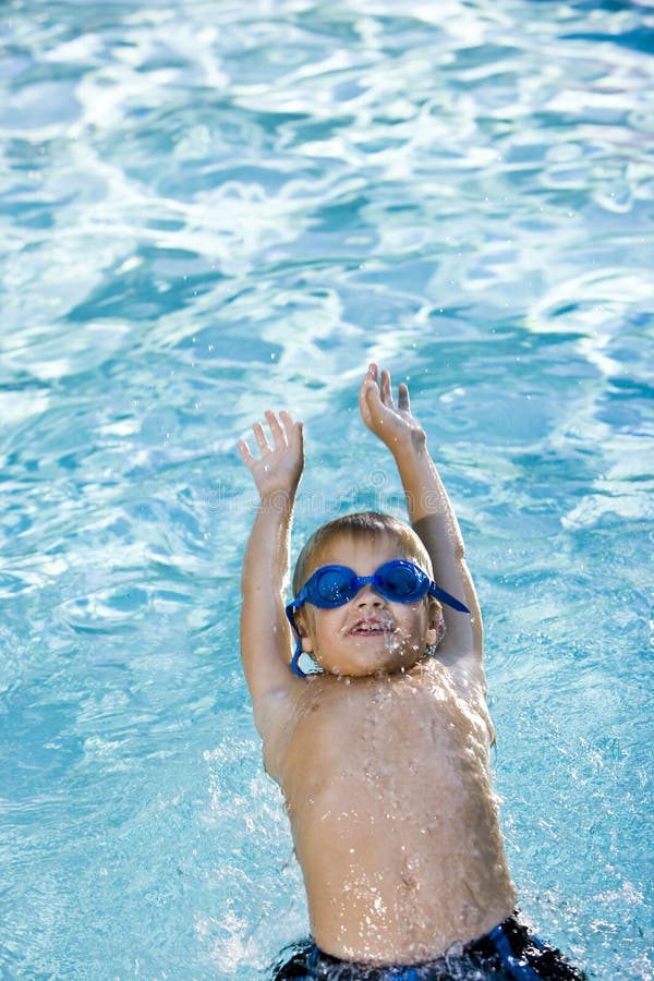 Boy Swimming on His Back in Pool Stock Photo - Image of person, blue ...