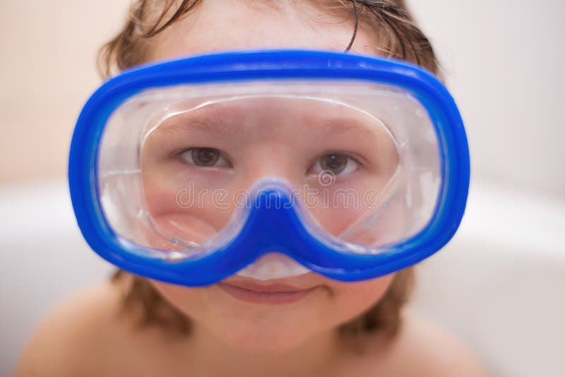 Boy in a swimming mask stock image. Image of nature - 107235009